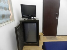 Quarto Executivo | Cortinas/cortinados opacos, Wi-fi grátis, roupa de cama fornecida 