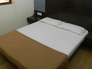 Quarto standard | Cortinas blackout, Wi-Fi de cortesia, roupa de cama
