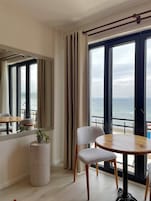 Quarto Deluxe, vista para o mar | Roupa de alta qualidade, minibar, secretĂĄria