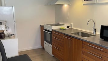 Anneks 1 | Cozinha privada | Uma cafeteira/bule