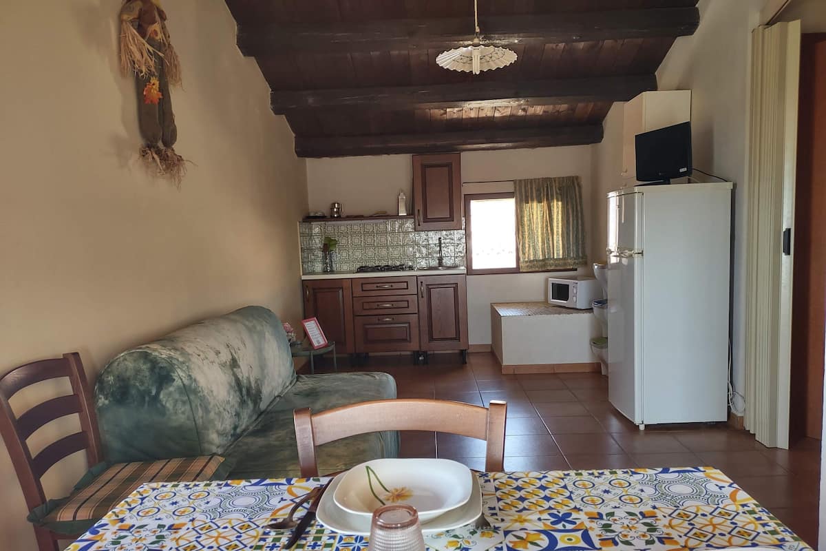Apartamento, 2 quartos | 1 quarto, roupas de cama premium, quartos à prova de som