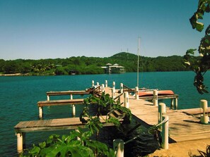 Luxury Waterfront Condo w/ Pool, Dock, and Gardens - Roatan | Vrbo