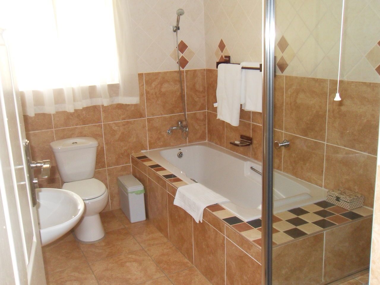 Chalé superluxo, vista para o jardim | Banheiro | Produtos de toalete grátis, secador de cabelo (mediante solicitação)