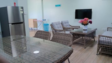 Apartamento empresarial | Cozinha privada | Fogão, chaleira elétrica, torradeira, produtos de limpeza