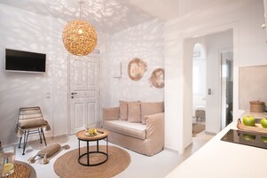 Apartamento, 1 quarto | Sala de estar | Smart TV de 32 polegadas com canais via satélite, televisor 