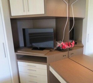 Apartamento família, várias camas, para não fumantes | Comodidades do quarto