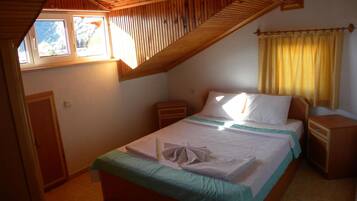 Apartamento Familiar, 2 quartos | 2 quartos, ferro/tábua de engomar, berços/camas para crianças