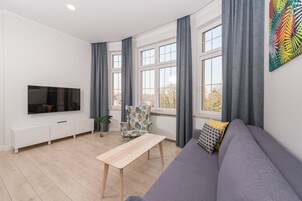 Apartamento Superior | Secretária, cortinas/cortinados opacos, quartos insonorizados 