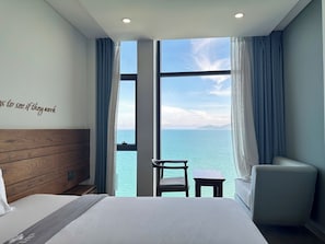 Quarto casal ou duplo luxo, vista para o oceano | Roupas de cama premium, frigobar, cofres nos quartos, escrivaninha