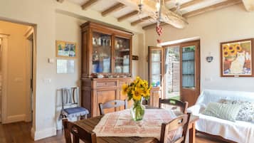 Suite Exclusiva, 1 quarto, vista para o jardim | Sala de estar | Piso aquecido