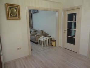 Apartamento Familiar | Sala de estar | Televisor LCD