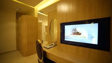 Suíte executiva, 1 quarto | Roupas de cama premium, frigobar, cofres nos quartos, escrivaninha