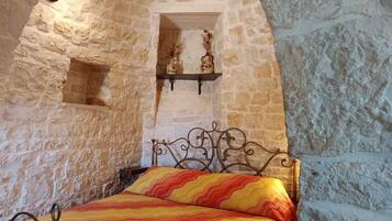 Apartamento Familiar, 2 quartos, kitchenette | Secretária, quartos insonorizados, ferro/tábua de engomar, Wi-fi grátis