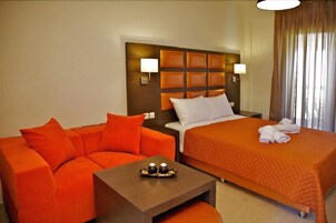 Apartamento, 1 quarto | Área de estar | TV