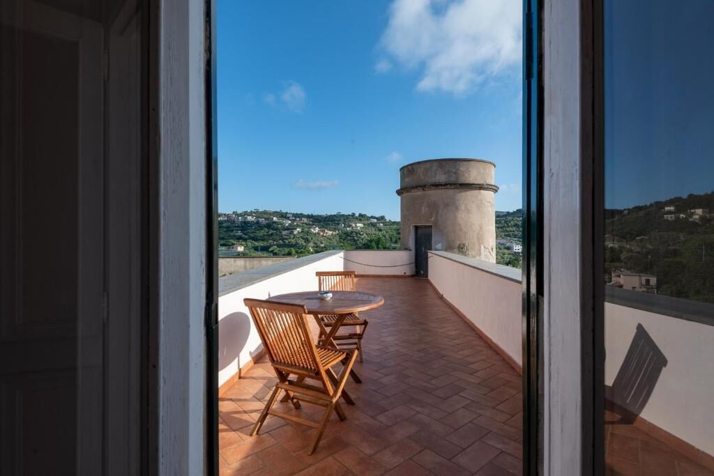 Suite, vista para o pátio | Refeições ao ar livre