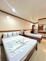 Quarto Executivo | Minibar, secretária, Wi-fi grátis, roupa de cama fornecida 