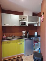 Suite-Estúdio Clássica, 1 quarto | Com decoração personalizada, com mobília individualizada 