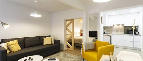 Apartamento, 1 quarto | Sala de estar | TV de ecrã plano