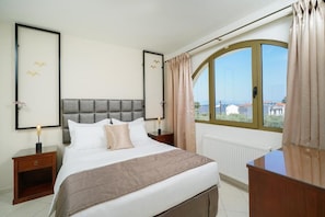 Suíte superior, 1 quarto | 1 quarto, quartos à prova de som, Wi-Fi de cortesia