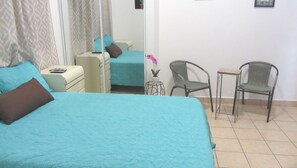 202 Basic Single Room, 1 Bedroom | Ferro/tábua de engomar, Wi-fi grátis, roupa de cama fornecida 