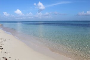 Na praia, toalhas de praia 