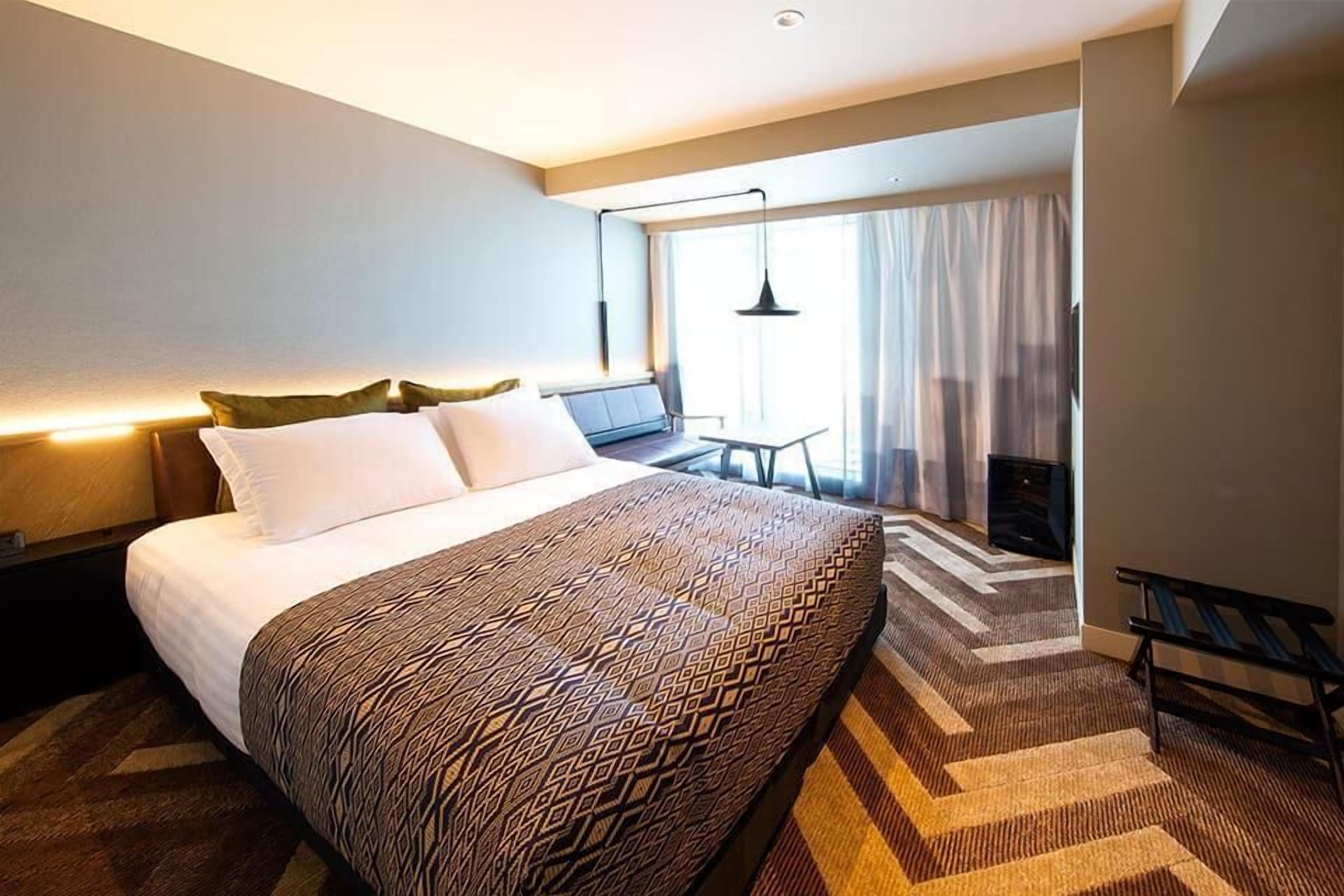 Quartos à prova de som, Wi-Fi de cortesia, roupa de cama