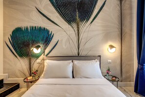 Suíte júnior (3 Persons) | Frigobar, cofres nos quartos, individualmente mobiliados, escrivaninha
