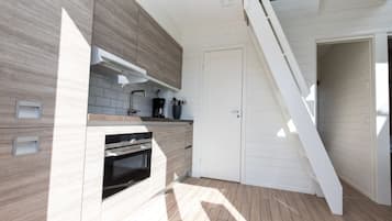 Suíte | Cozinha privada | Geladeira, micro-ondas, fogão, cooktop