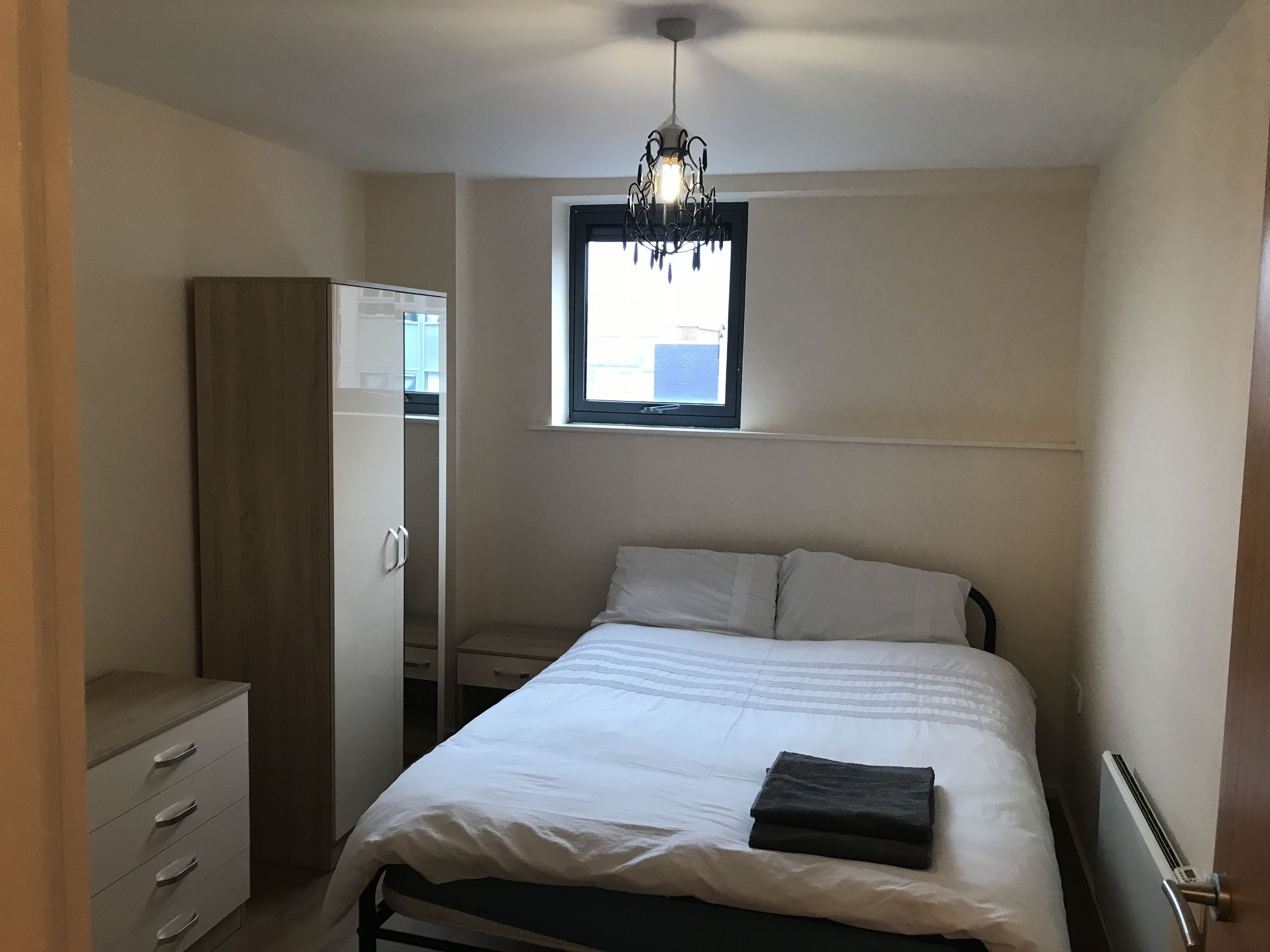 Apartamento Deluxe | 2 quartos, cortinas/cortinados opacos, ferro/tábua de engomar 