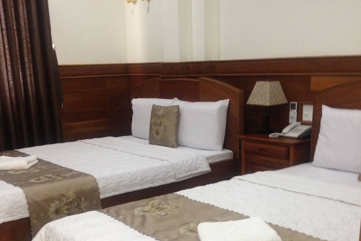 Quarto Quádruplo Deluxe, 1 quarto, não fumadores, frigorífico (2) | Minibar, cofre no quarto, quartos insonorizados, ferro/tábua de engomar