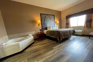 Suíte estúdio luxo, 1 cama King, para não fumantes | Cofres nos quartos, escrivaninha, cortinas blackout