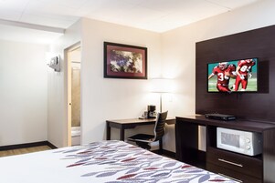 Quarto luxo, 1 cama King, para não fumantes | Escrivaninha, berços grátis, camas extras/dobráveis (sobretaxa)