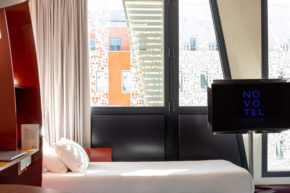 Suite Familiar, várias camas | Minibar, cofre com capacidade para portátil, secretária