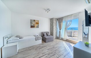 Apartamento Romântico, varanda, vista para o mar | Cofre no quarto, quartos insonorizados, ferro/tábua de engomar 