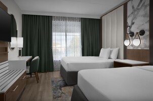 Roupas de cama premium, cofres nos quartos, escrivaninha
