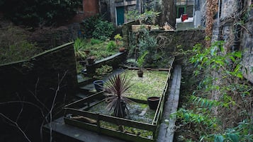 Quarto Triplo Comfort | Vista para o jardim