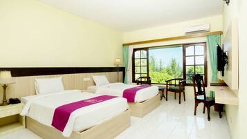 Quarto casal ou duplo superior, vista para o jardim | Vista para praia/oceano