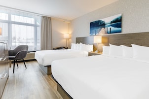 Quarto executivo, 2 camas Queen | Escrivaninha, cortinas blackout, quartos à prova de som