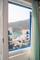 Suite Familiar, vista para o mar | Edredões de penas, quartos insonorizados, ferro/tábua de engomar 