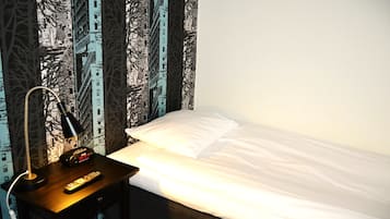 Quarto solteiro superior | Ferros/tábuas de passar roupa, Wi-Fi de cortesia, roupa de cama