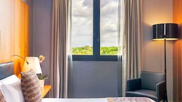 1 quarto, edredões de penas, minibar