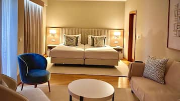 Magnolia Suite | Frigobar, cofres nos quartos, Wi-Fi de cortesia, roupa de cama