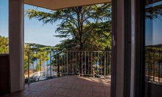 Quarto casal ou duplo standard, sacada | Escrivaninha, cortinas blackout, Wi-Fi de cortesia, roupa de cama