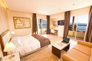 Suíte executiva, vista para o mar | Roupas de cama premium, edredons de pluma