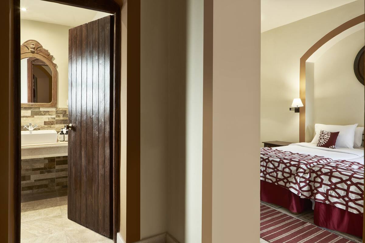 Quarto standard | Frigobar, cofres nos quartos, cortinas blackout, Wi-Fi de cortesia