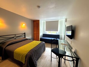 Quarto standard | Cofres nos quartos, escrivaninha, Wi-Fi de cortesia, roupa de cama