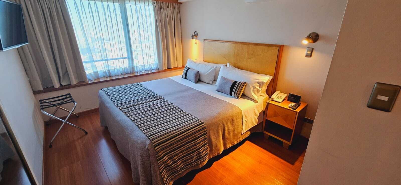 Suite Standard, Vista para a cidade | Cofre no quarto, roupa de cama fornecida 