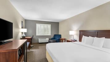 Quarto Standard, 1 cama king-size, não fumadores | Camas de colchão pillowtop, secretária, ferro/tábua de engomar