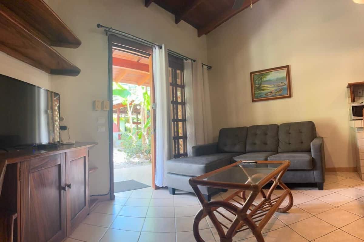 Suite Familiar, 3 quartos, cozinha, vista para a piscina | Sala de estar