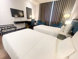 Quarto Deluxe | Minibar, secretária, cortinas/cortinados opacos, Wi-fi grátis 
